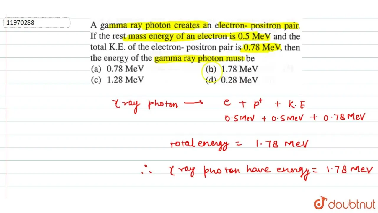 A gamma ray photon creates an electron-positron pair. If the rest mass